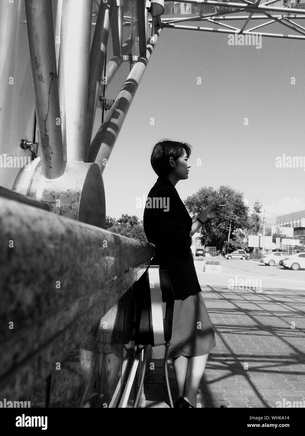 Young asian woman smoking cigarette hi-res stock photography and images ...
