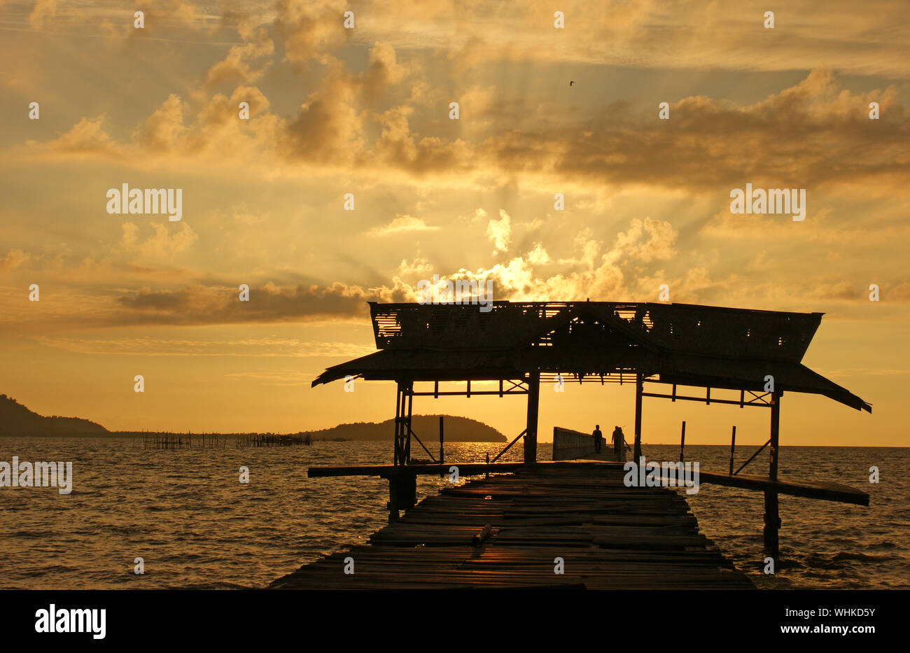 Sunset at Dermaga Pantai Kijing Beach, Sungai Duri, West Kalimantan ...