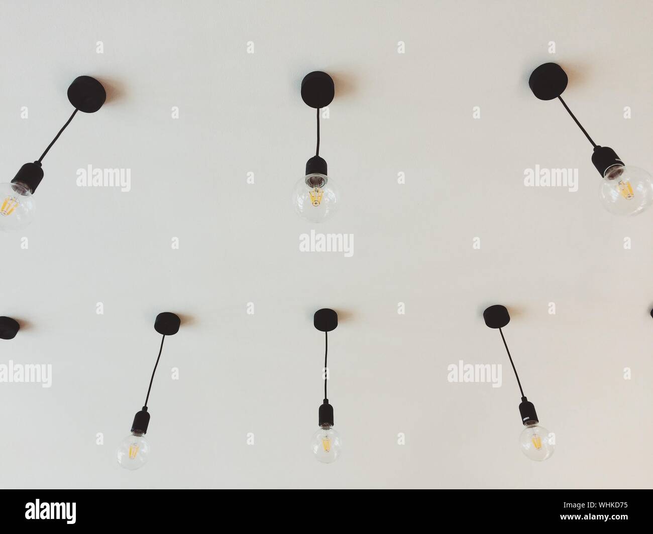 Illuminated row light bulbs ceiling ceiling hi-res stock photography ...