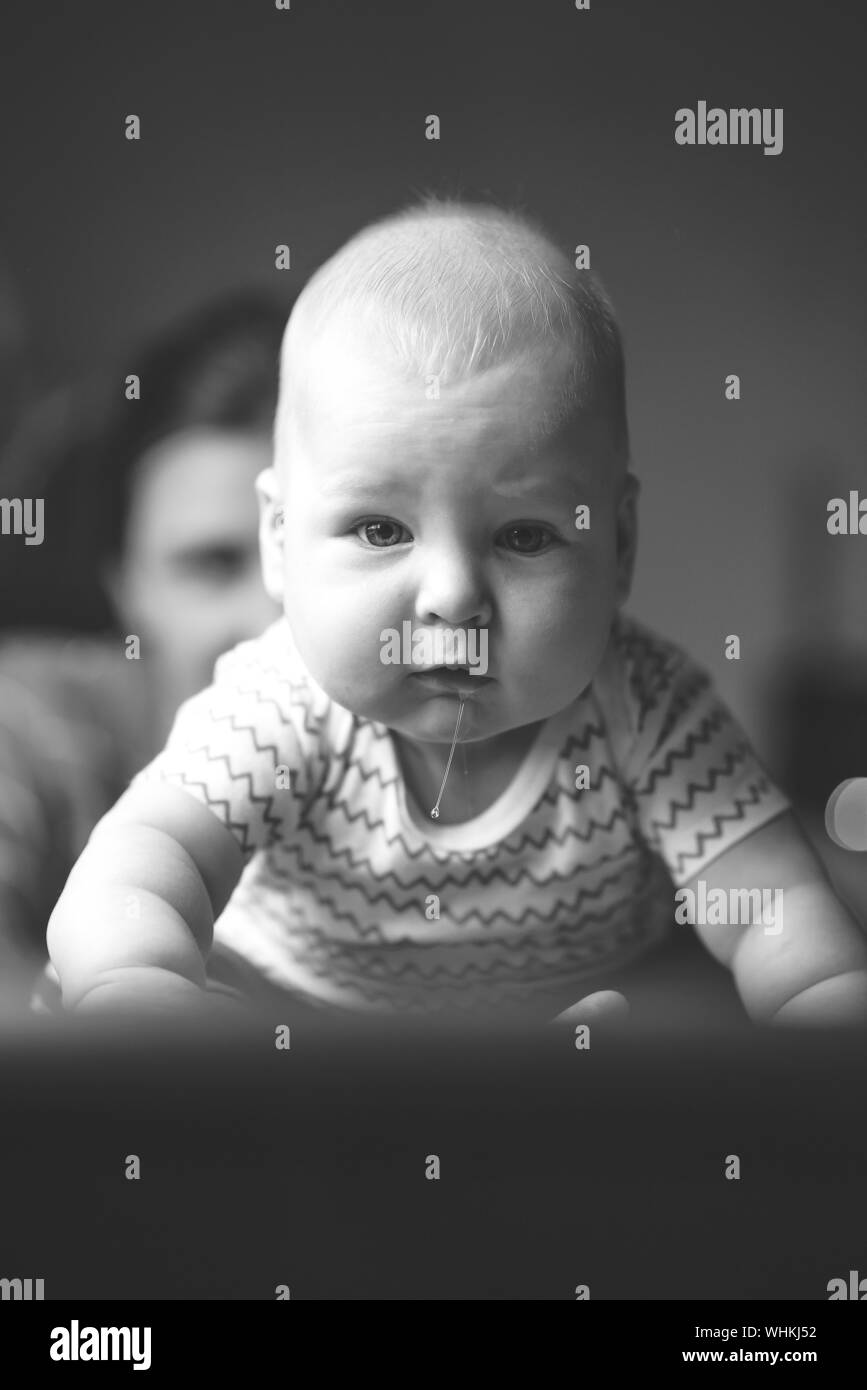 Baby saliva Black and White Stock Photos & Images - Alamy