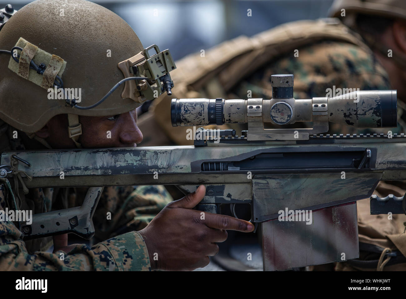 A U.S. Marine with the scout sniper platoon, Battalion Landing Team ...