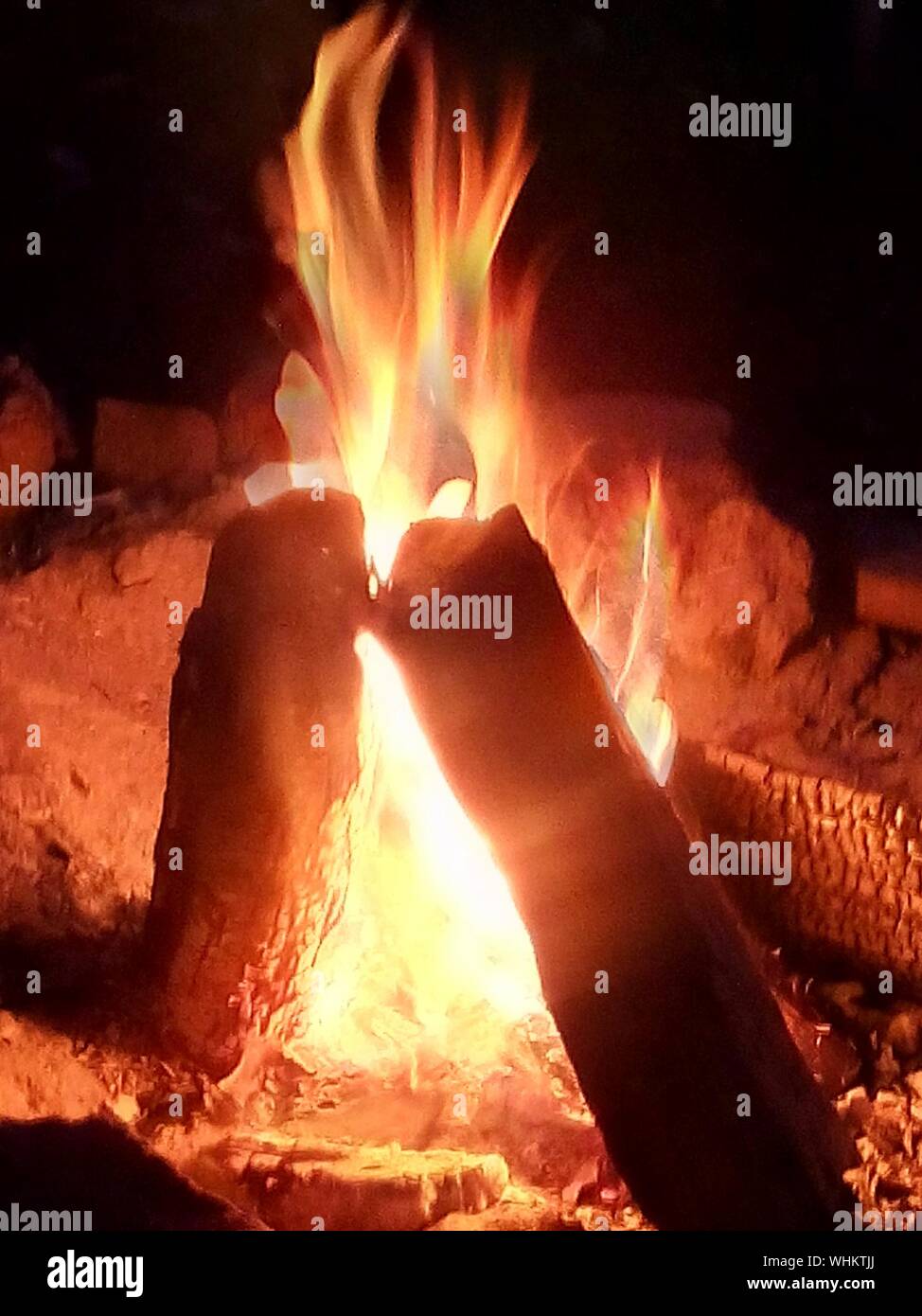 Campfire On Field At Night Stock Photo - Alamy