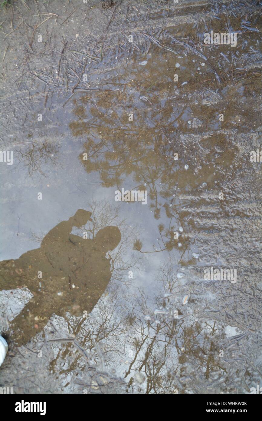 Man puddle hi-res stock photography and images - Alamy