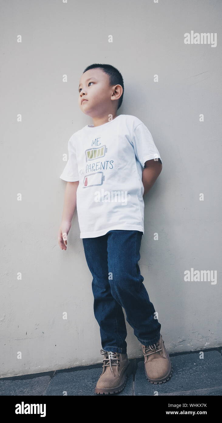 One boy standing hi-res stock photography and images - Alamy
