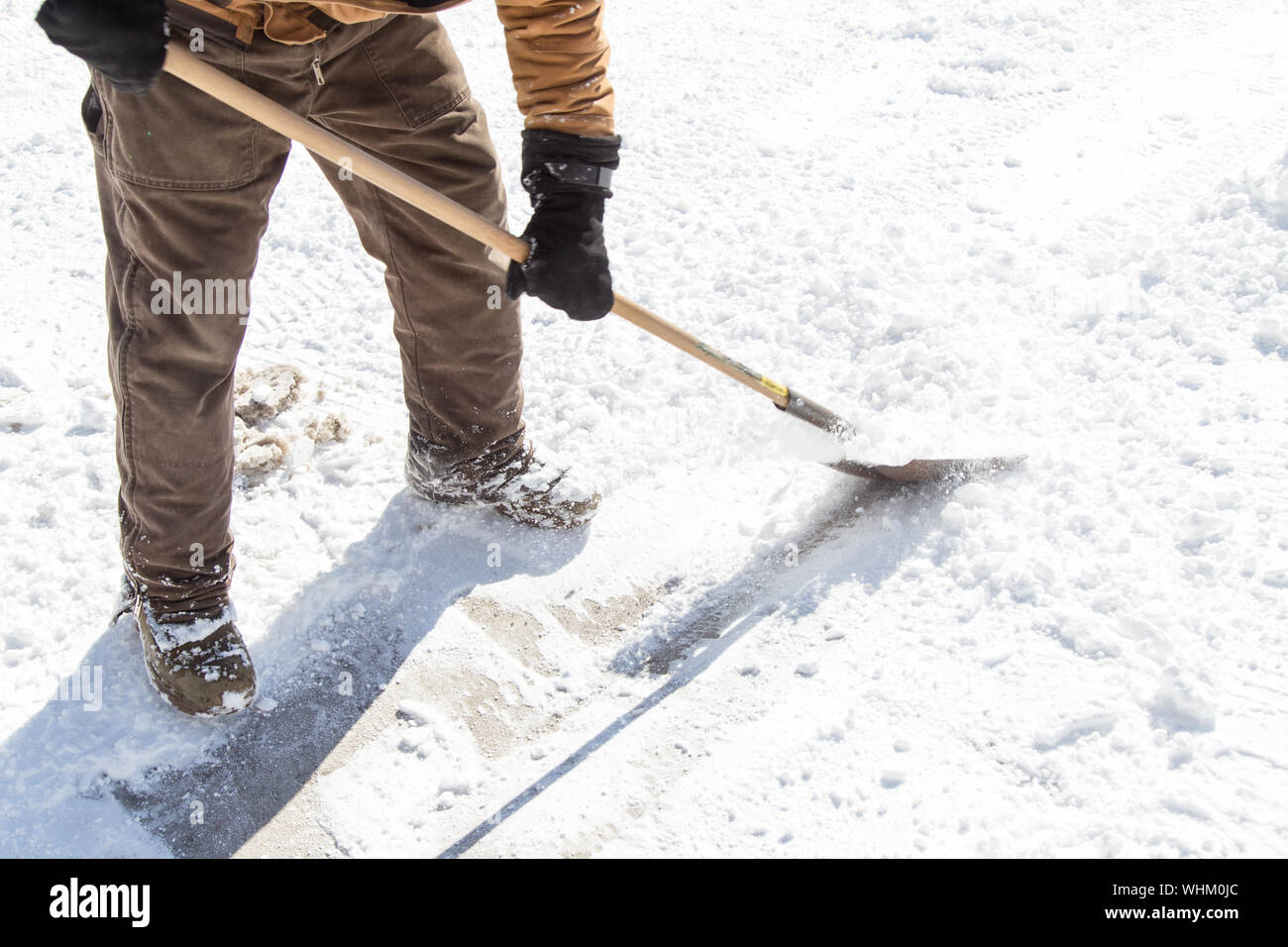 Person shoveling snow hi-res stock photography and images - Alamy