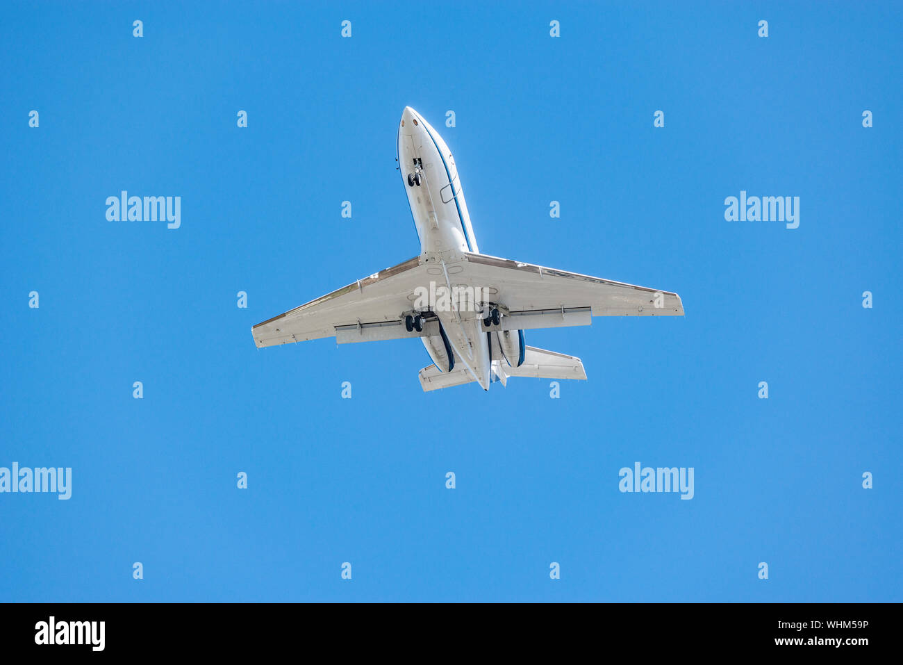 Landing of the passenger plane at day time Stock Photo - Alamy