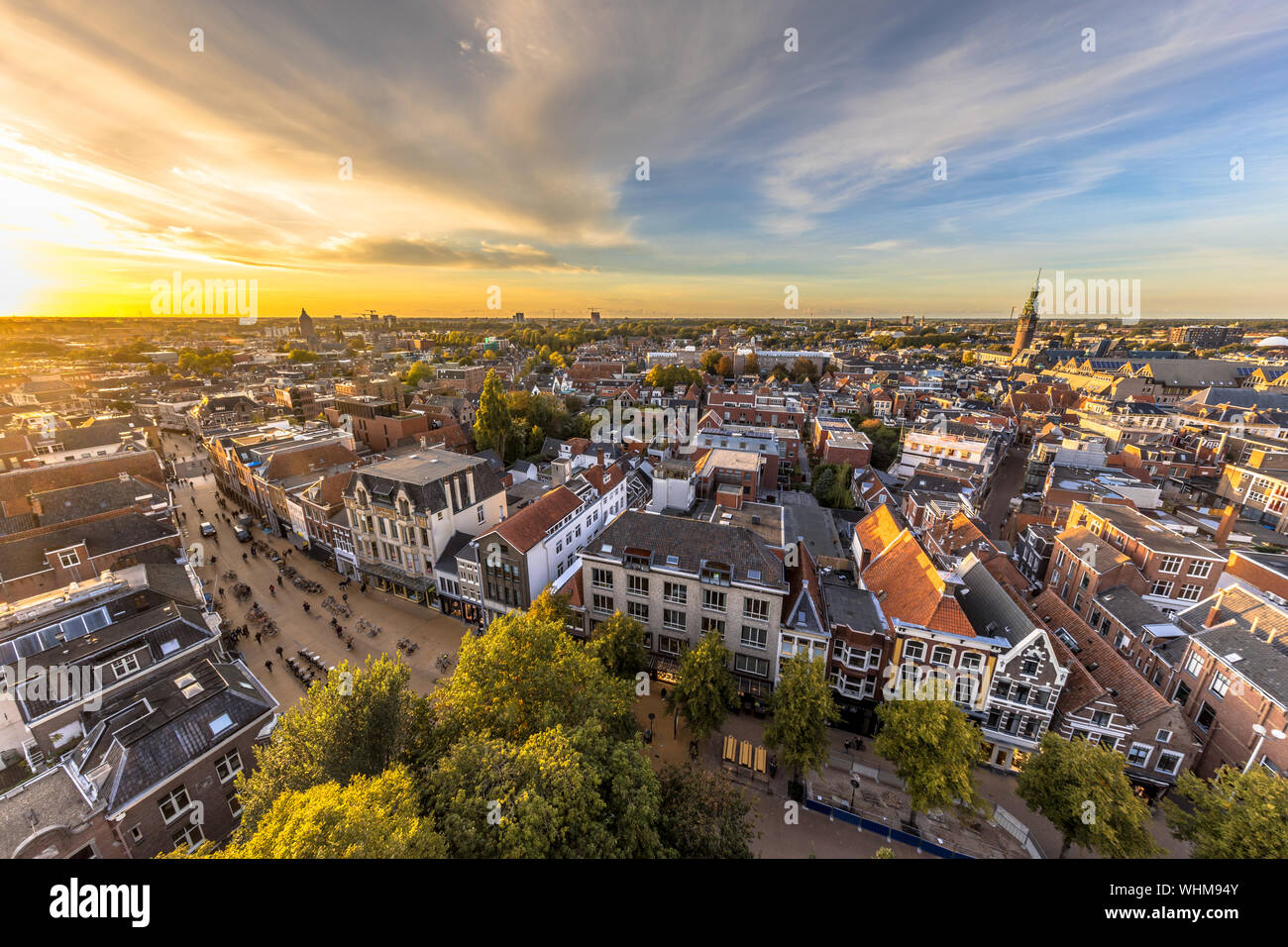 Aerial Skyline view of historic Groningen city centre under setting sun ...