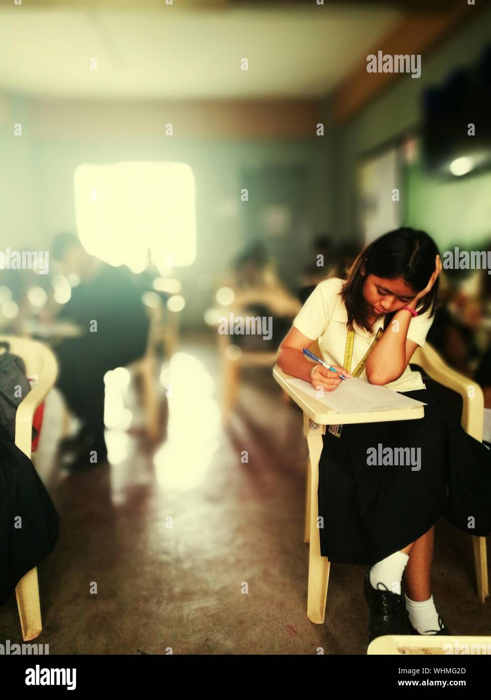 Classroom students writing hi-res stock photography and images - Alamy
