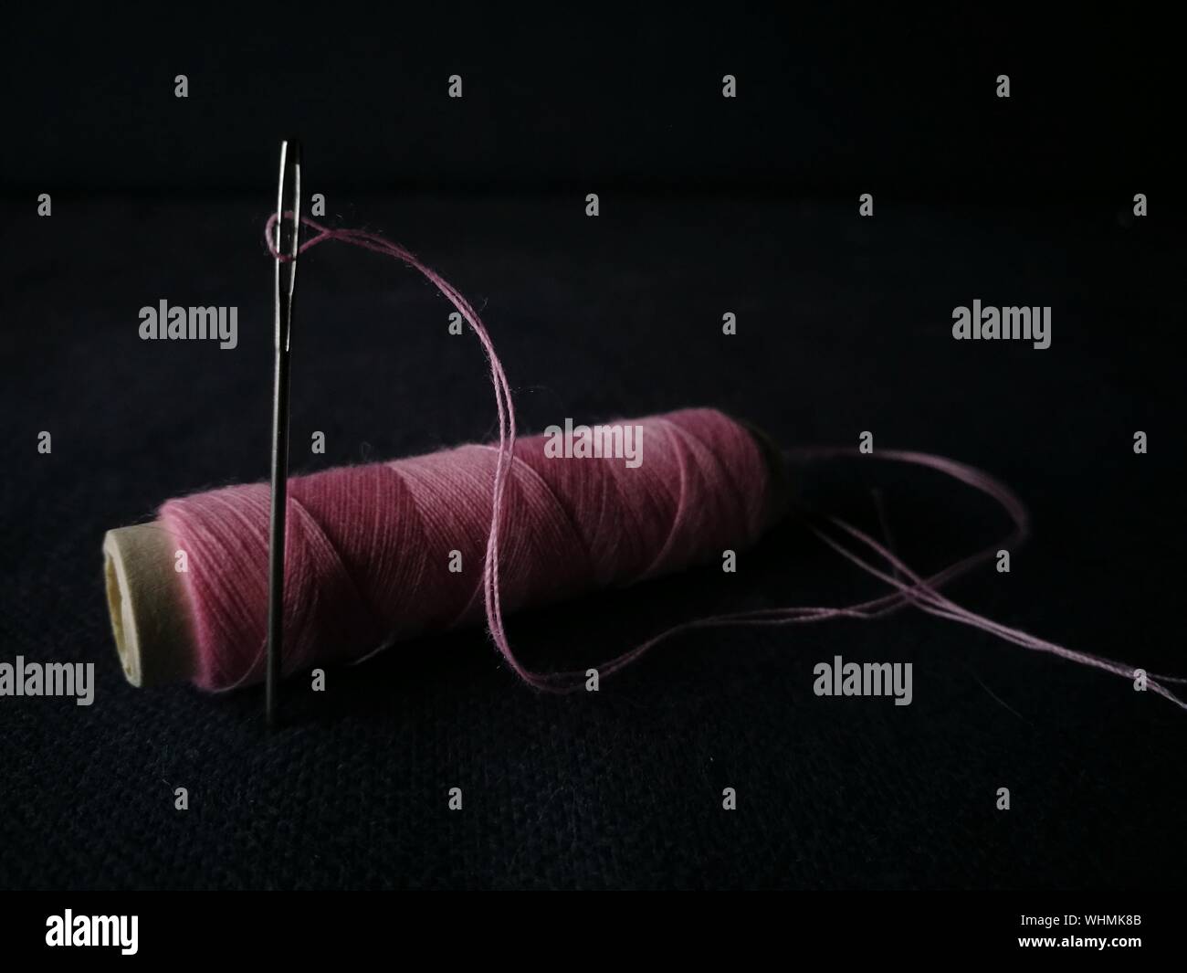Thread spool with needle hi-res stock photography and images - Alamy
