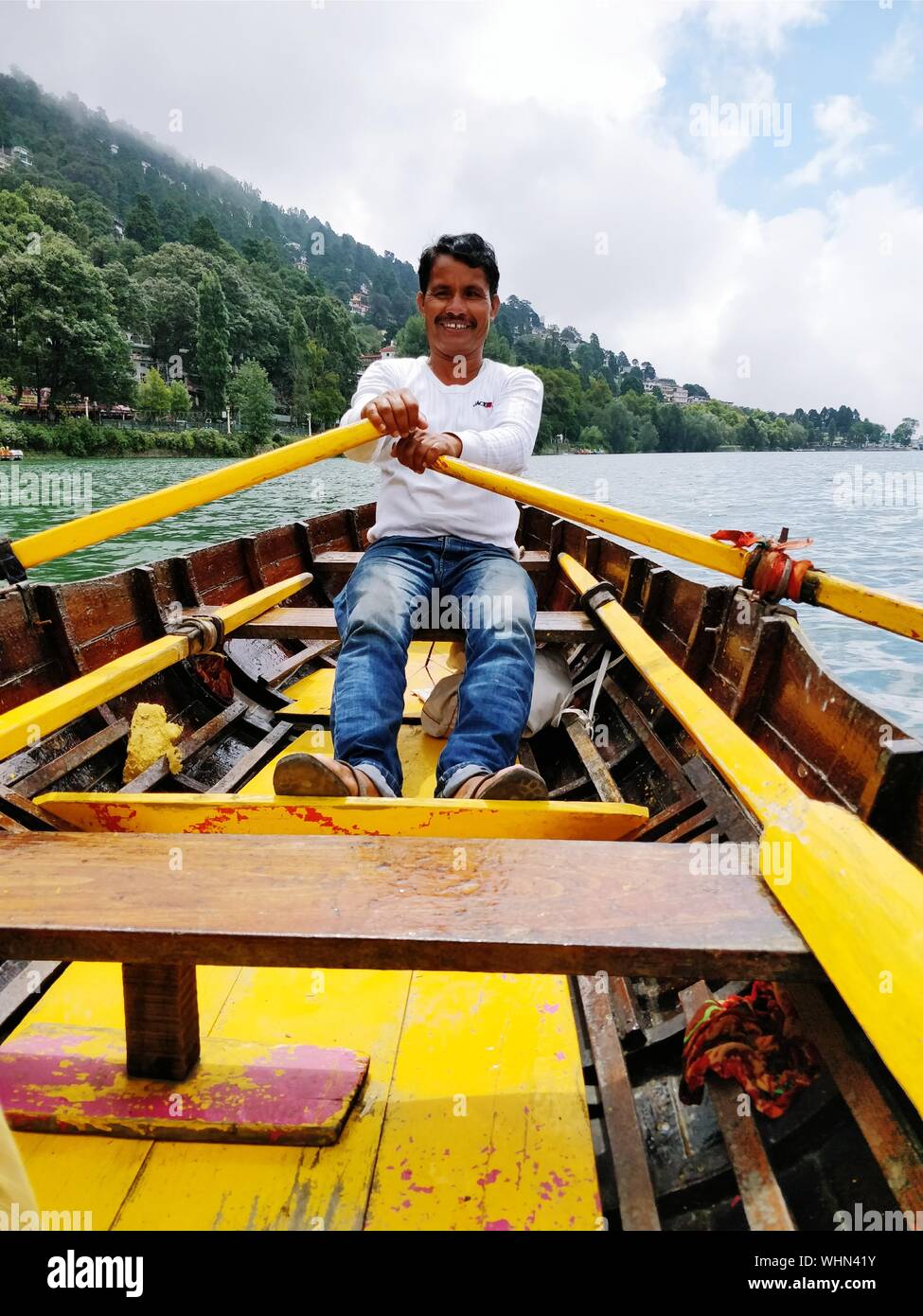 Man sitting in boat working hi-res stock photography and images - Alamy