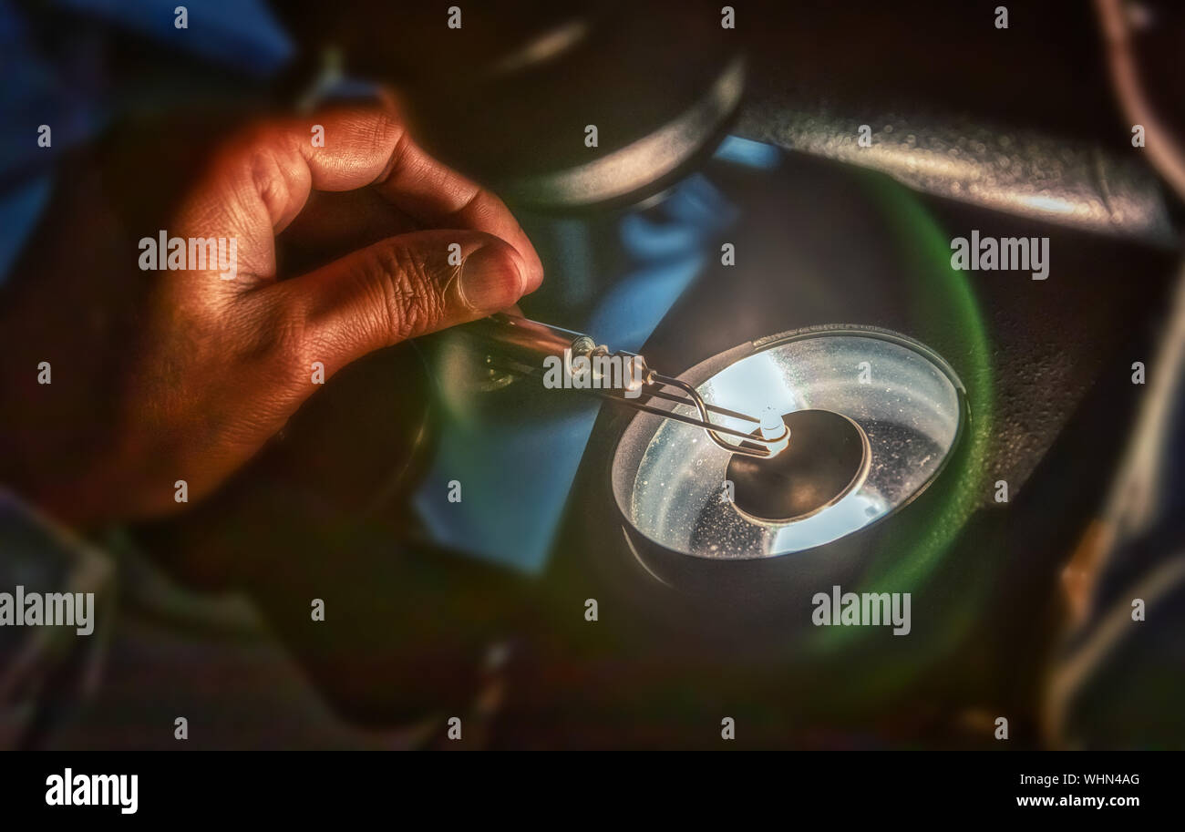 grading clarity on diamonds, microscope and magnifing glass, african ...