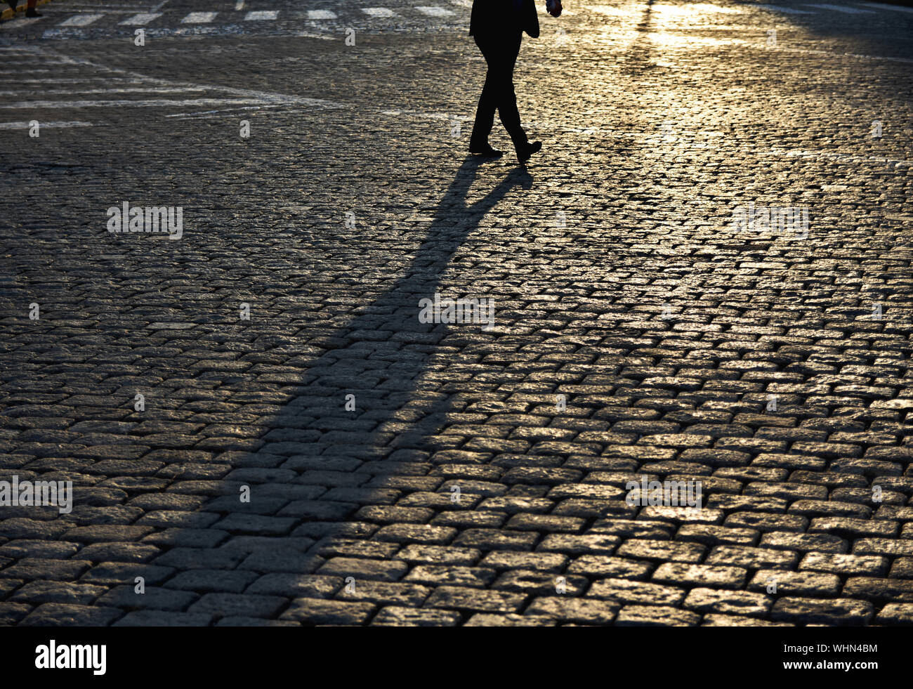 Man walking on paving hi-res stock photography and images - Alamy
