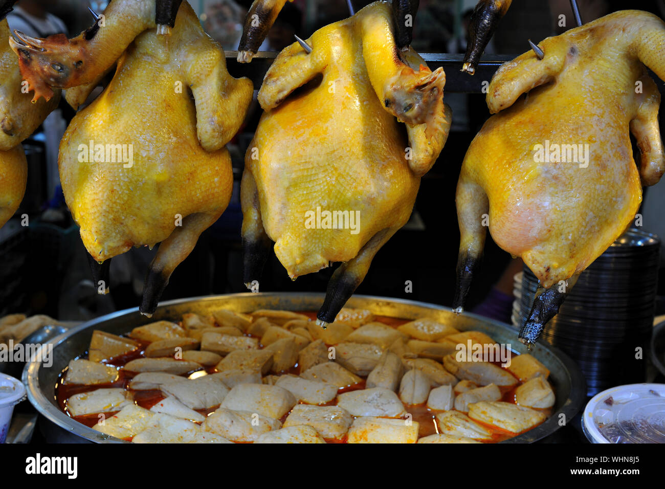 Hanging roast chicken hi-res stock photography and images - Alamy