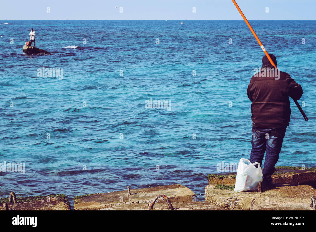 Carrying Fishing Rod High Resolution Stock Photography and Images - Alamy