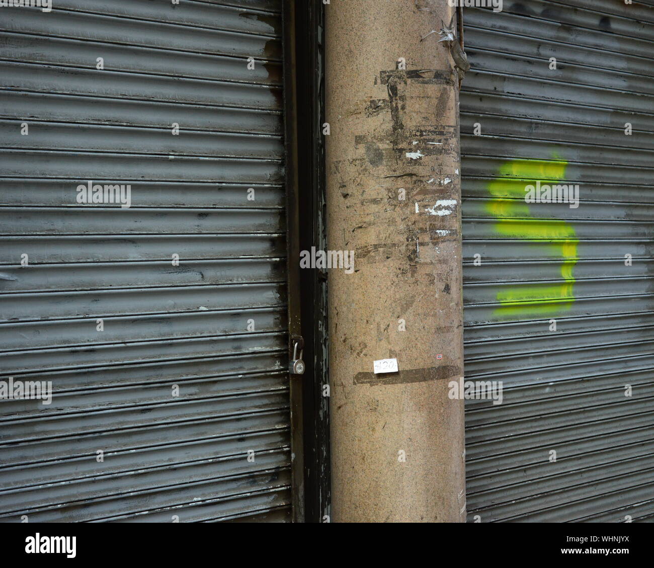 Letter S On Closed Shutter Of Store Stock Photo - Alamy