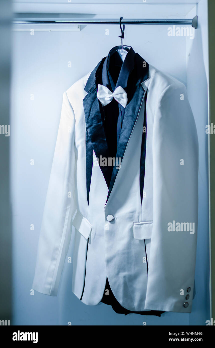 Hanging suit hi-res stock photography and images - Alamy