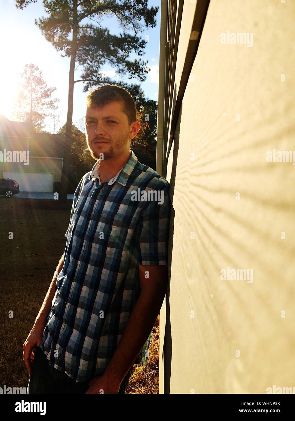 Young man leaning back hi-res stock photography and images - Alamy