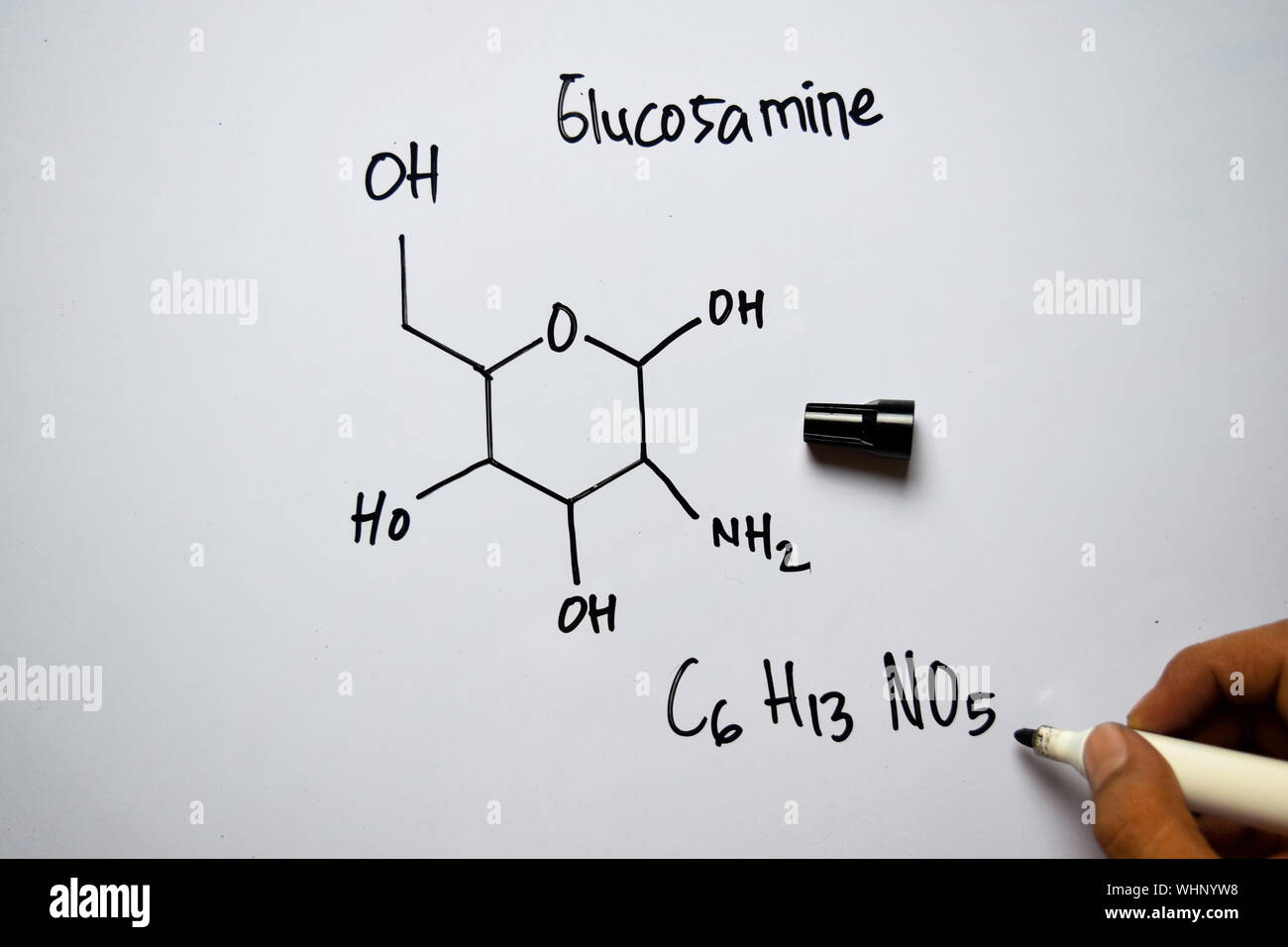 Glucosamine (C6,H13,NO5) molecule written on the white board ... Glucosamine (C6,H13,NO5) molecule written on the white board ...
