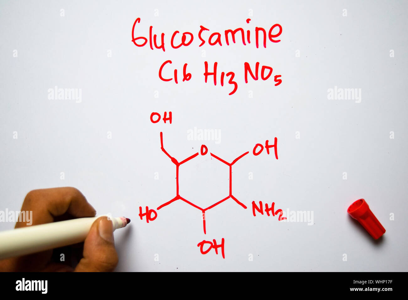 Glucosamine (C16,H13,NO5) molecule written on the white board ... Glucosamine (C16,H13,NO5) molecule written on the white board ...