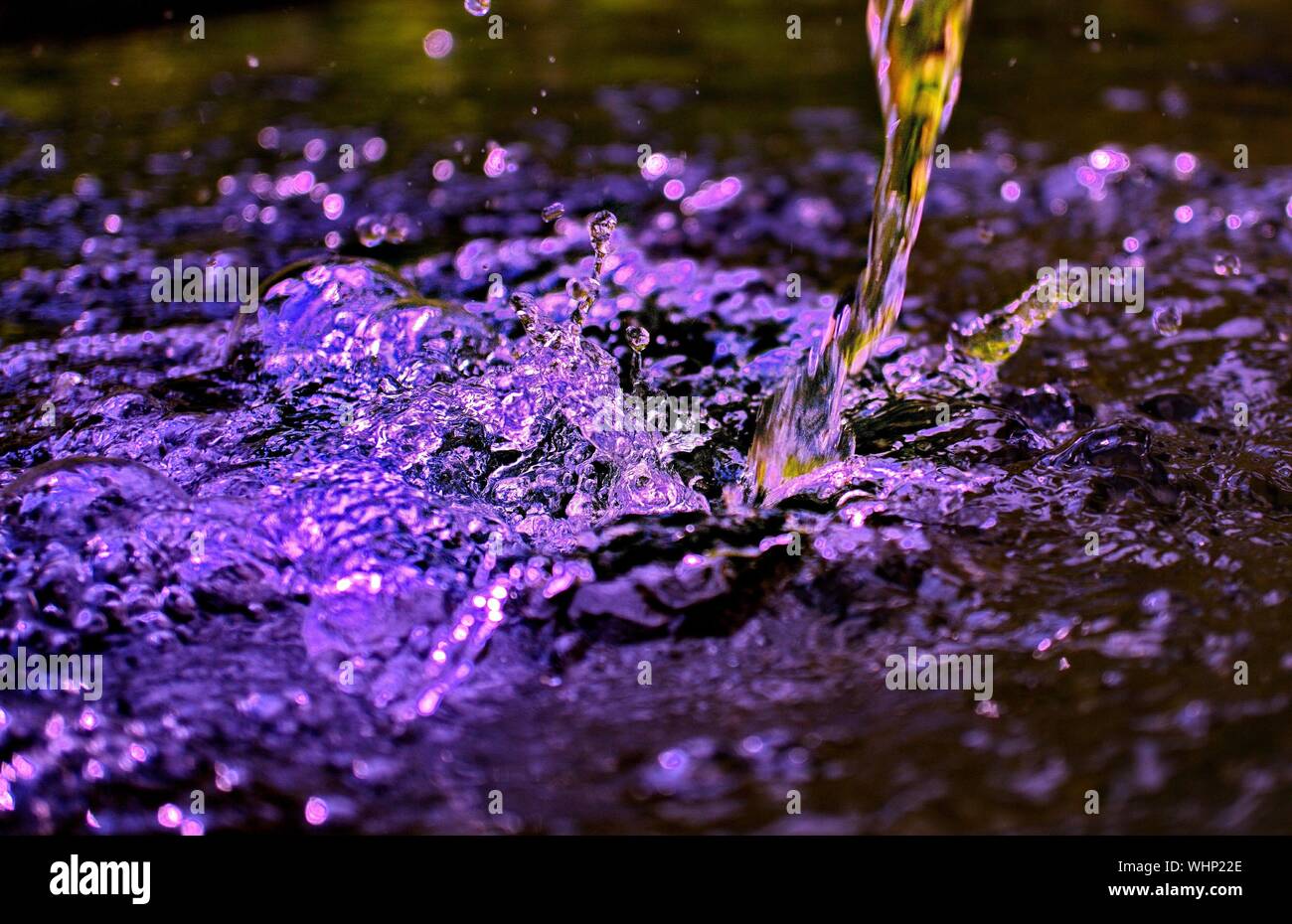 Splashing purple hi-res stock photography and images - Alamy