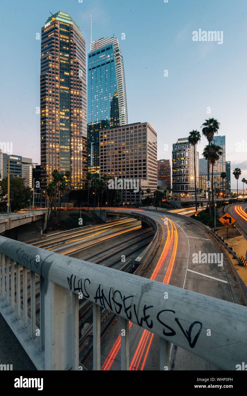 Cityscape skyline view of the 110 Freeway at night in downtown Los ...