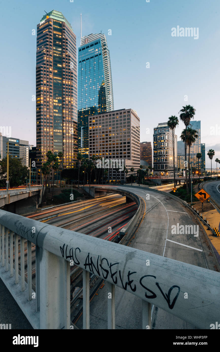 Cityscape skyline view of the 110 Freeway at night in downtown Los ...