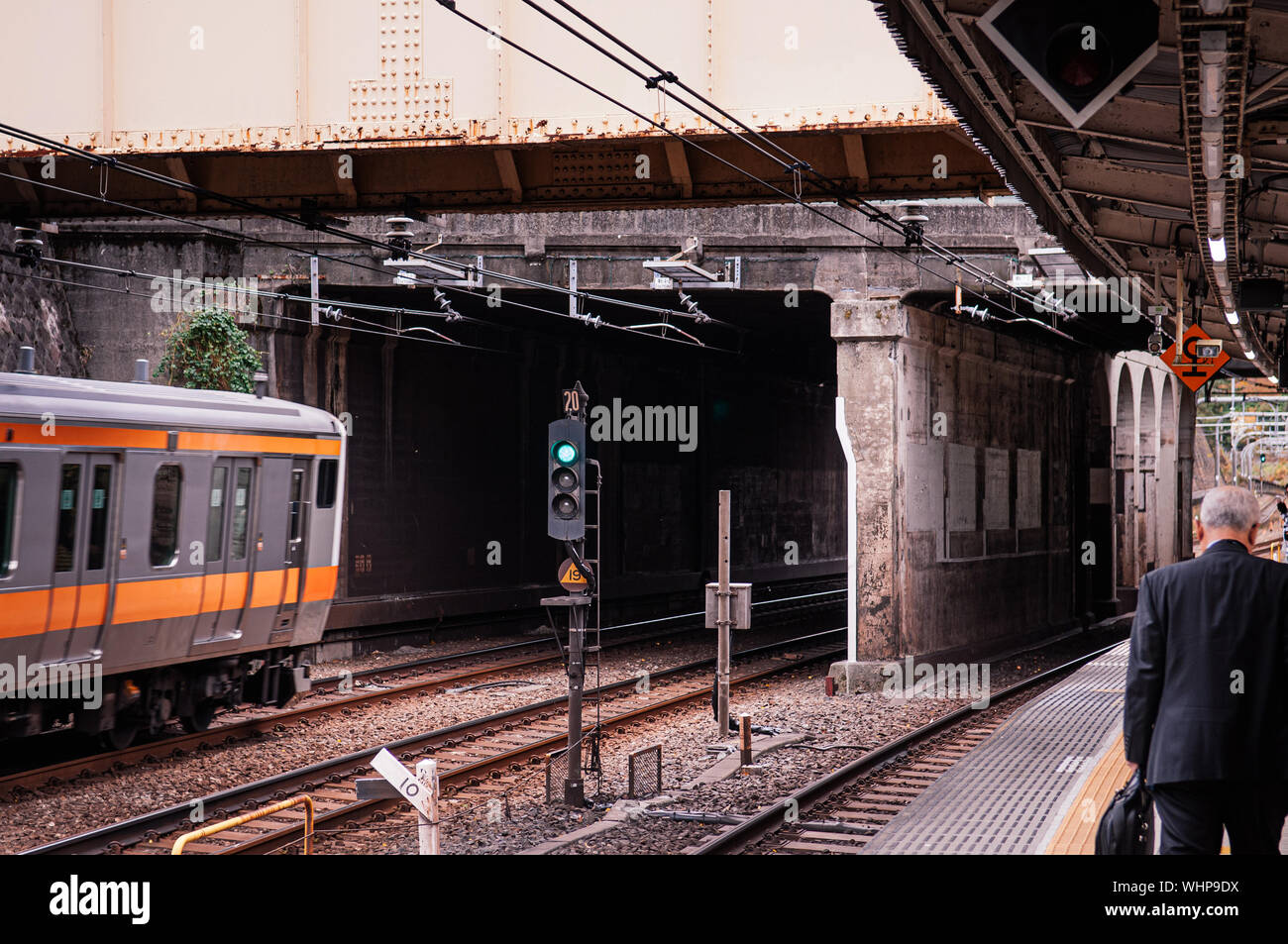 DEC 5, 2019 Tokyo, JAPAN - Tokyo JR Chuo line train leaving station ...