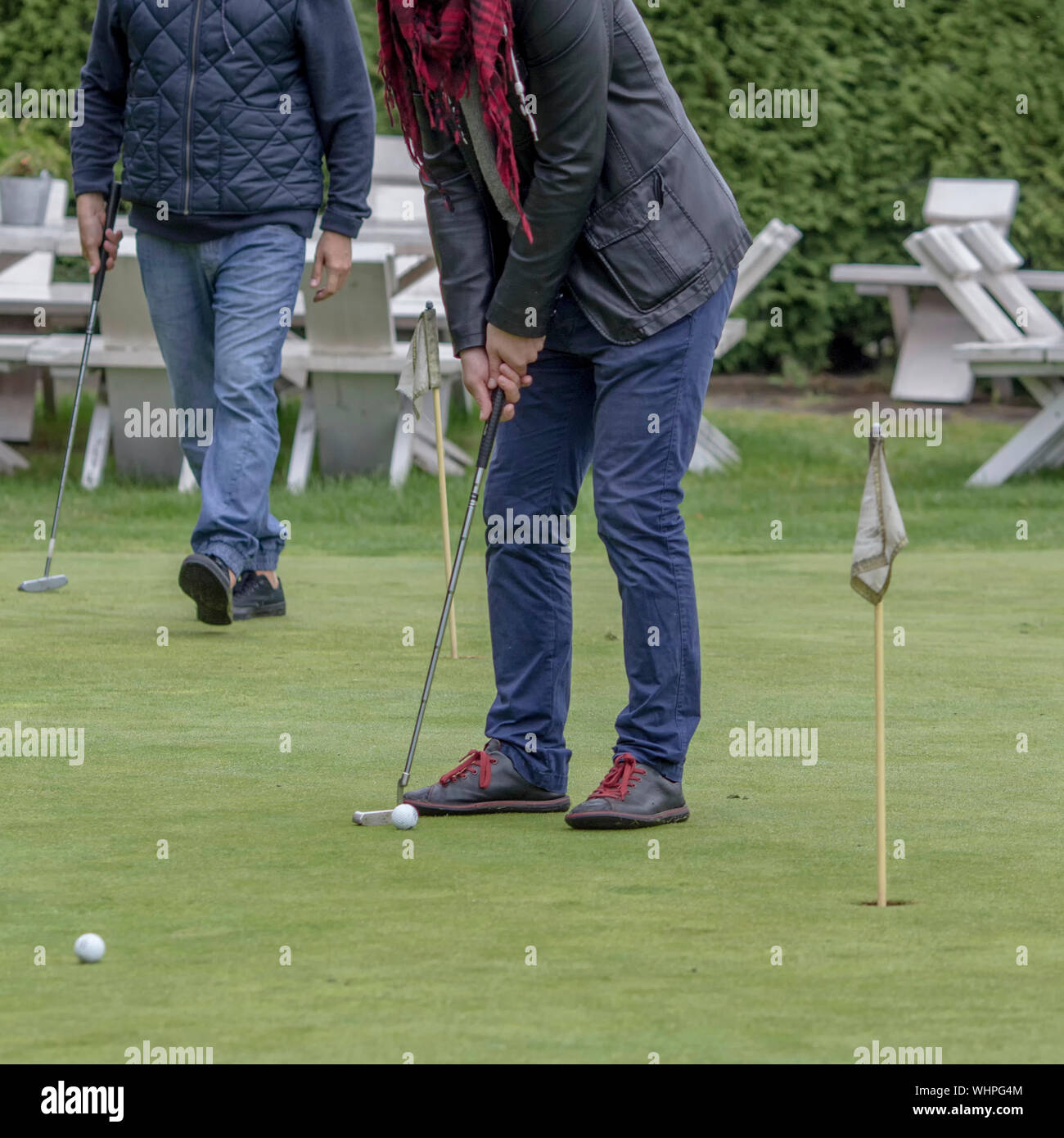 People playing golf hi-res stock photography and images - Alamy