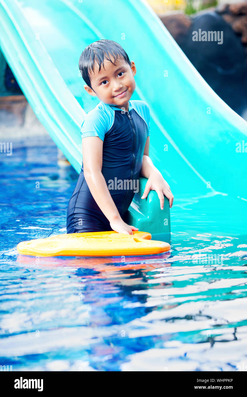Boy water slide hi-res stock photography and images - Alamy