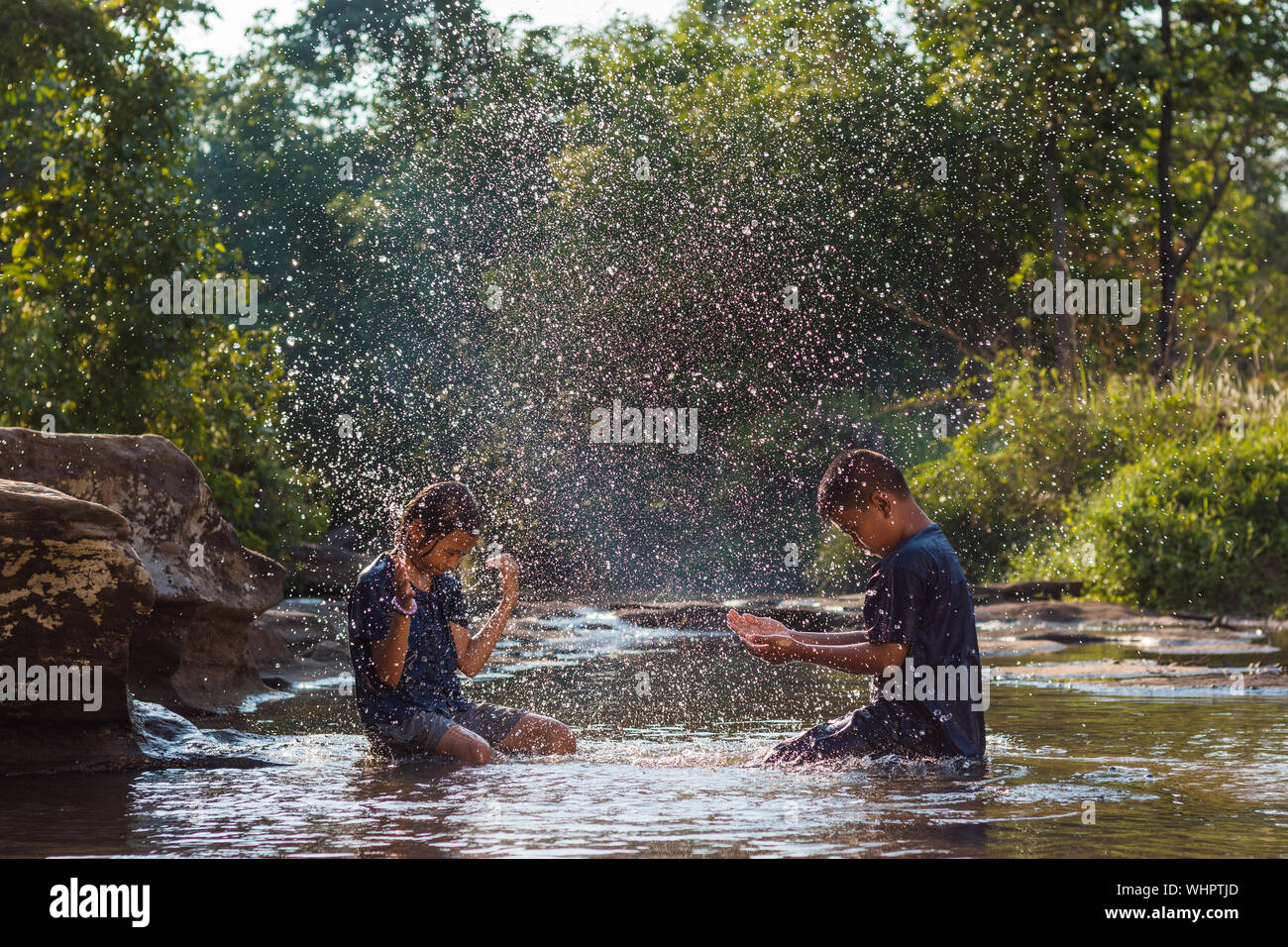 Friends playing outdoors hi-res stock photography and images - Alamy