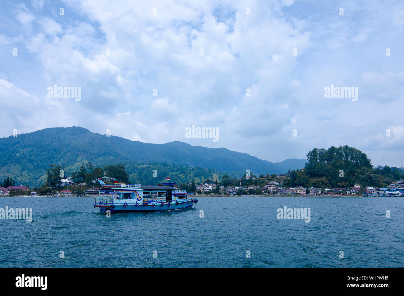 a ship sailing at Lake Toba, North Sumatra, Indonesia Stock Photo - Alamy