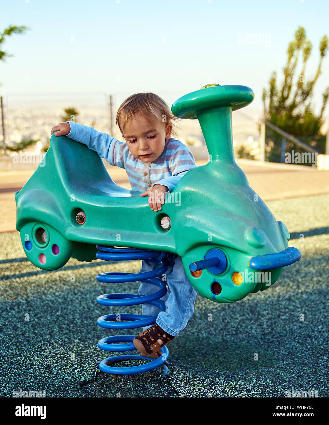 Playground ride child hi-res stock photography and images - Alamy