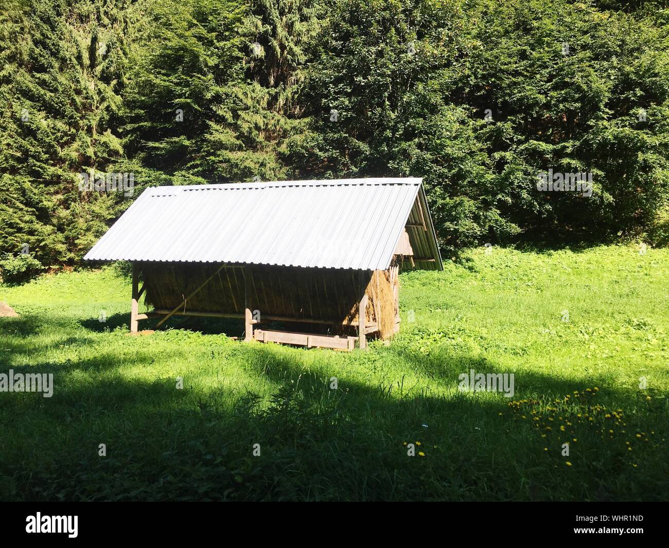View Of Built Structure On Grassland Stock Photo - Alamy