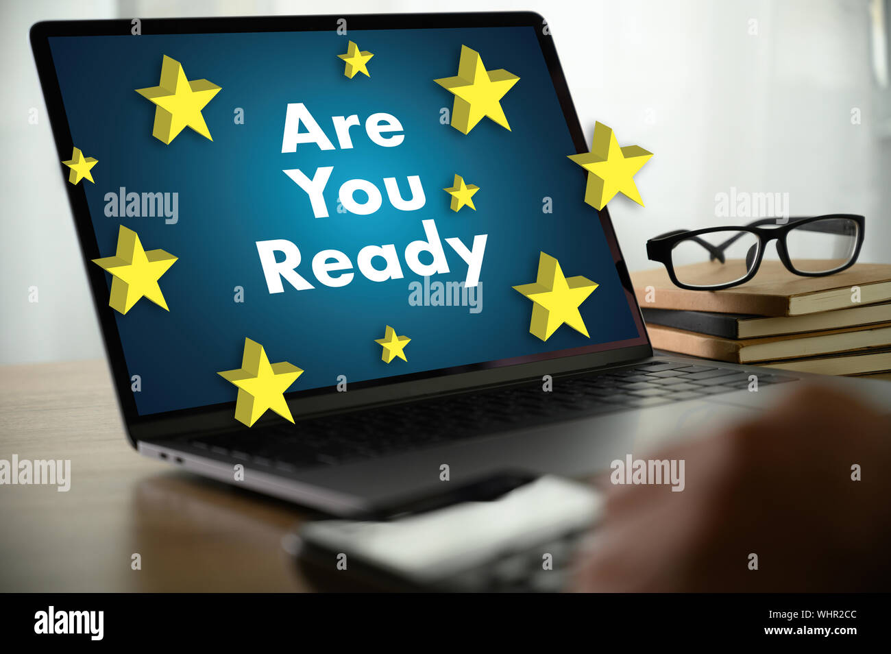 ARE YOU READY? Businessman work hard desktop with laptop, tablet READY ...