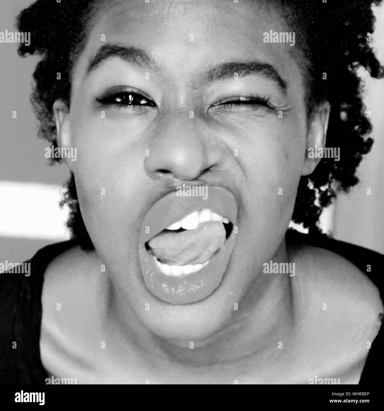 Woman headshot winking hi-res stock photography and images - Alamy