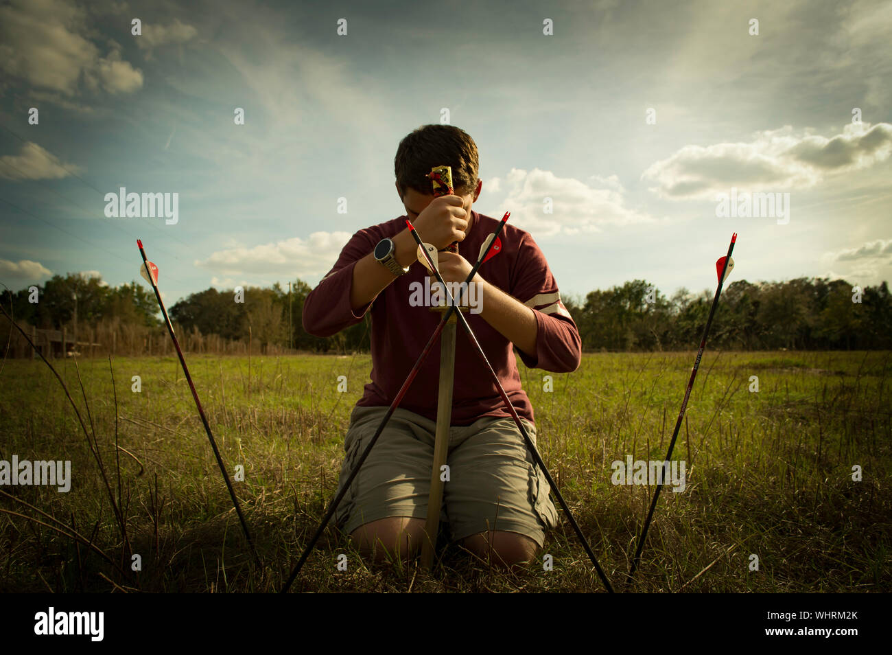 Holding sword and arrow hi-res stock photography and images - Alamy