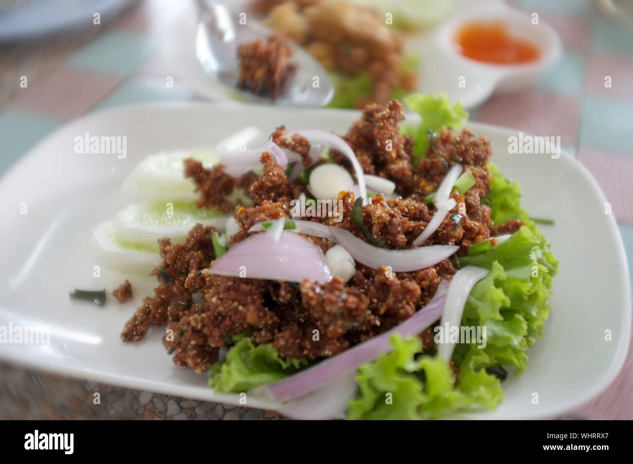 Thai name is Lab Moo Tod or Deep fried spicy minced pork with spicy ...