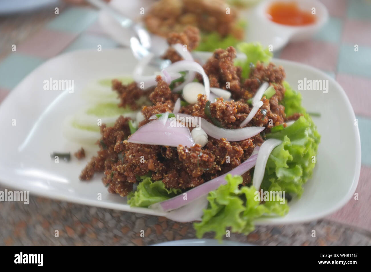 Thai name is Lab Moo Tod or Deep fried spicy minced pork with spicy ...