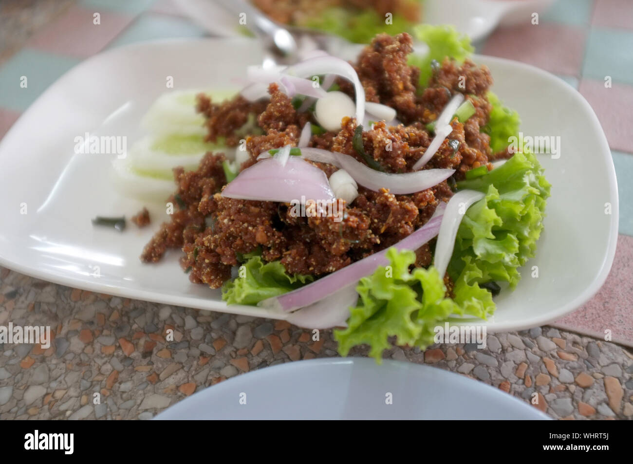 Thai name is Lab Moo Tod or Deep fried spicy minced pork with spicy ...