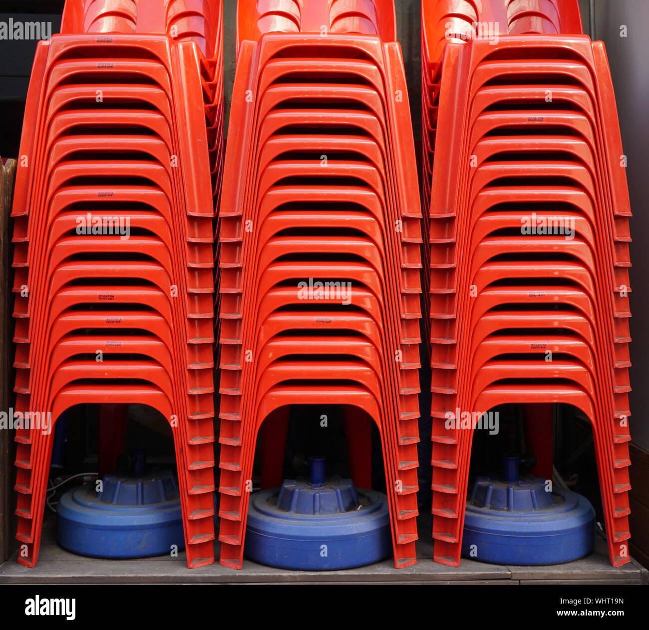 Stack of red chairs hi-res stock photography and images - Alamy