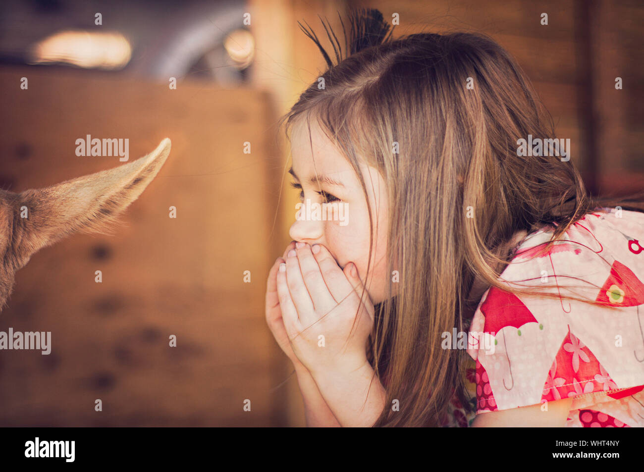 Whispering in ear hi-res stock photography and images - Alamy