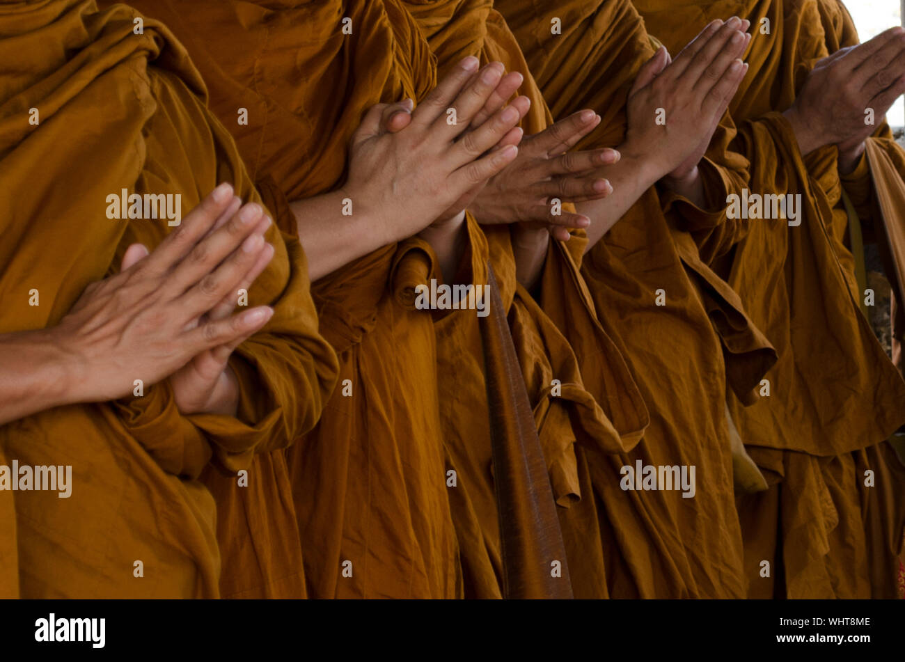 Praying hands monk hi-res stock photography and images - Alamy