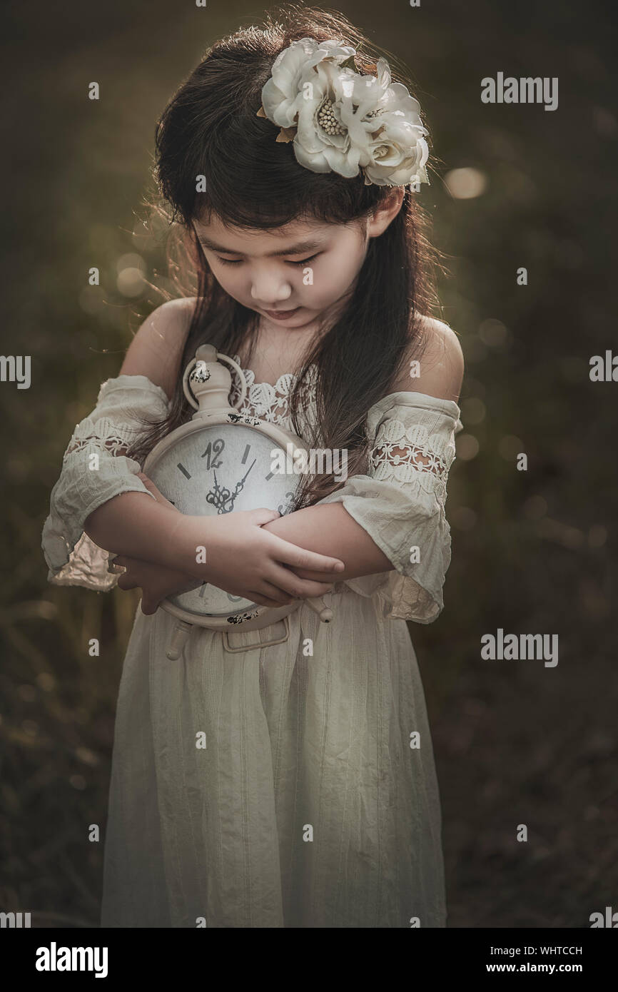 Girl clock hi-res stock photography and images - Alamy