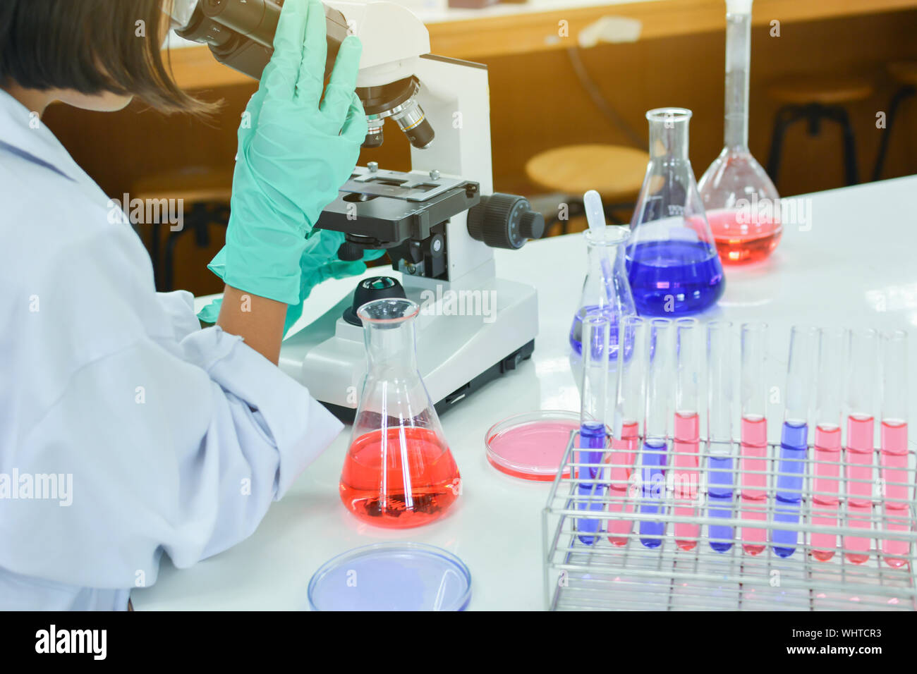 Scientist in laboratory microscope hi-res stock photography and images ...
