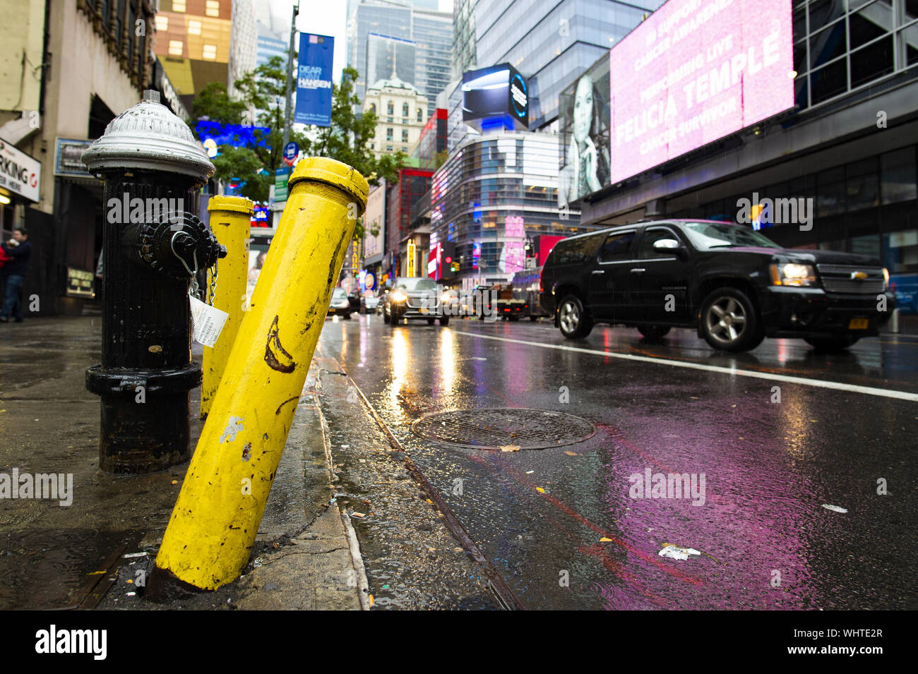 Traffic jam in Times Square during a rainy day. Times Square is a major ...