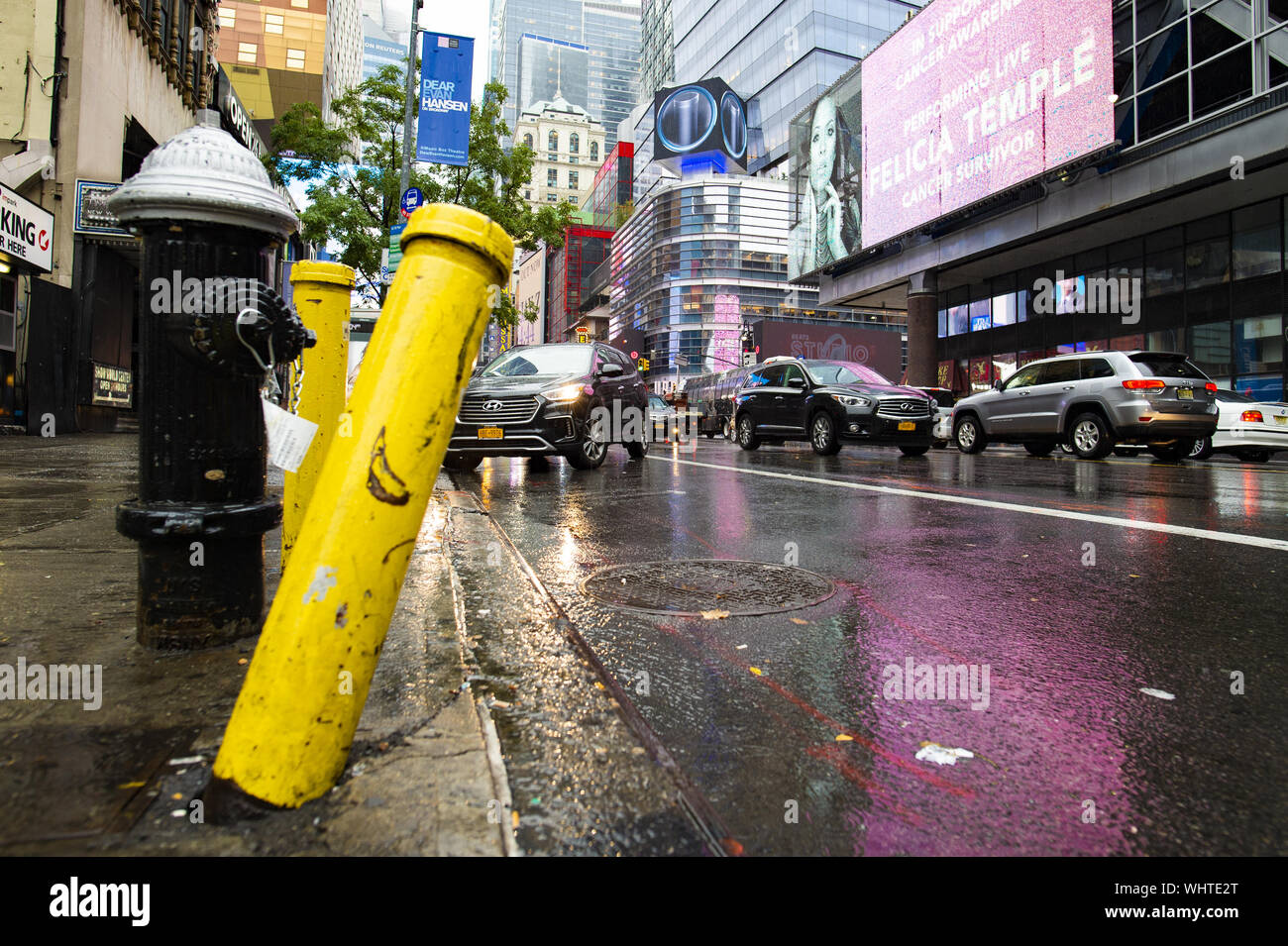Traffic jam in Times Square during a rainy day. Times Square is a major ...