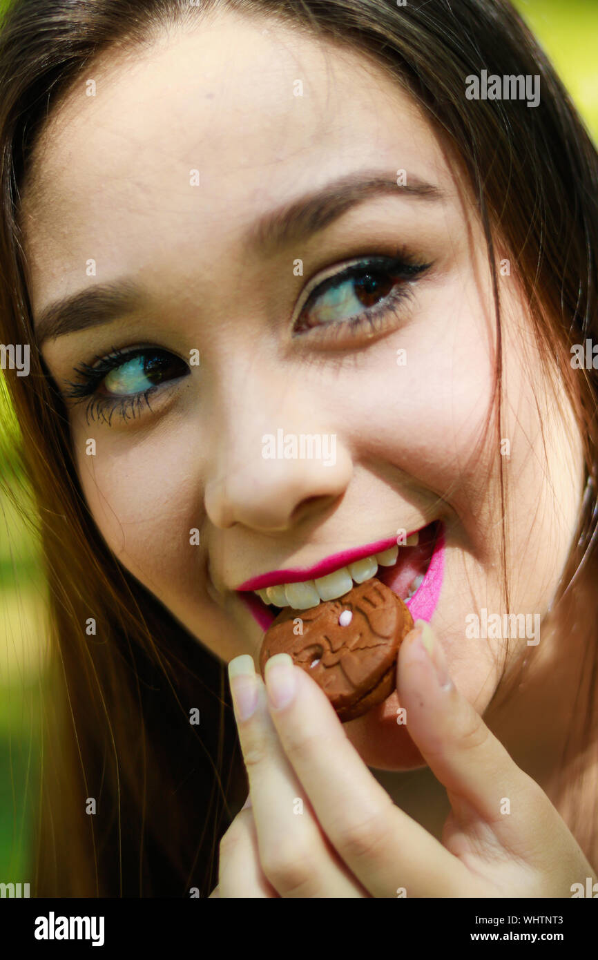 Adult eating candy hi-res stock photography and images - Alamy