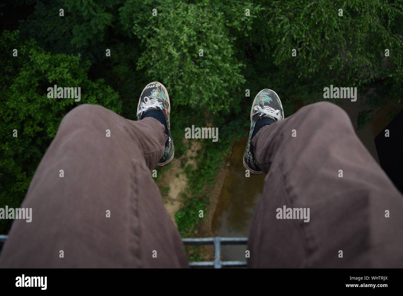 Dangling leg hi-res stock photography and images - Alamy