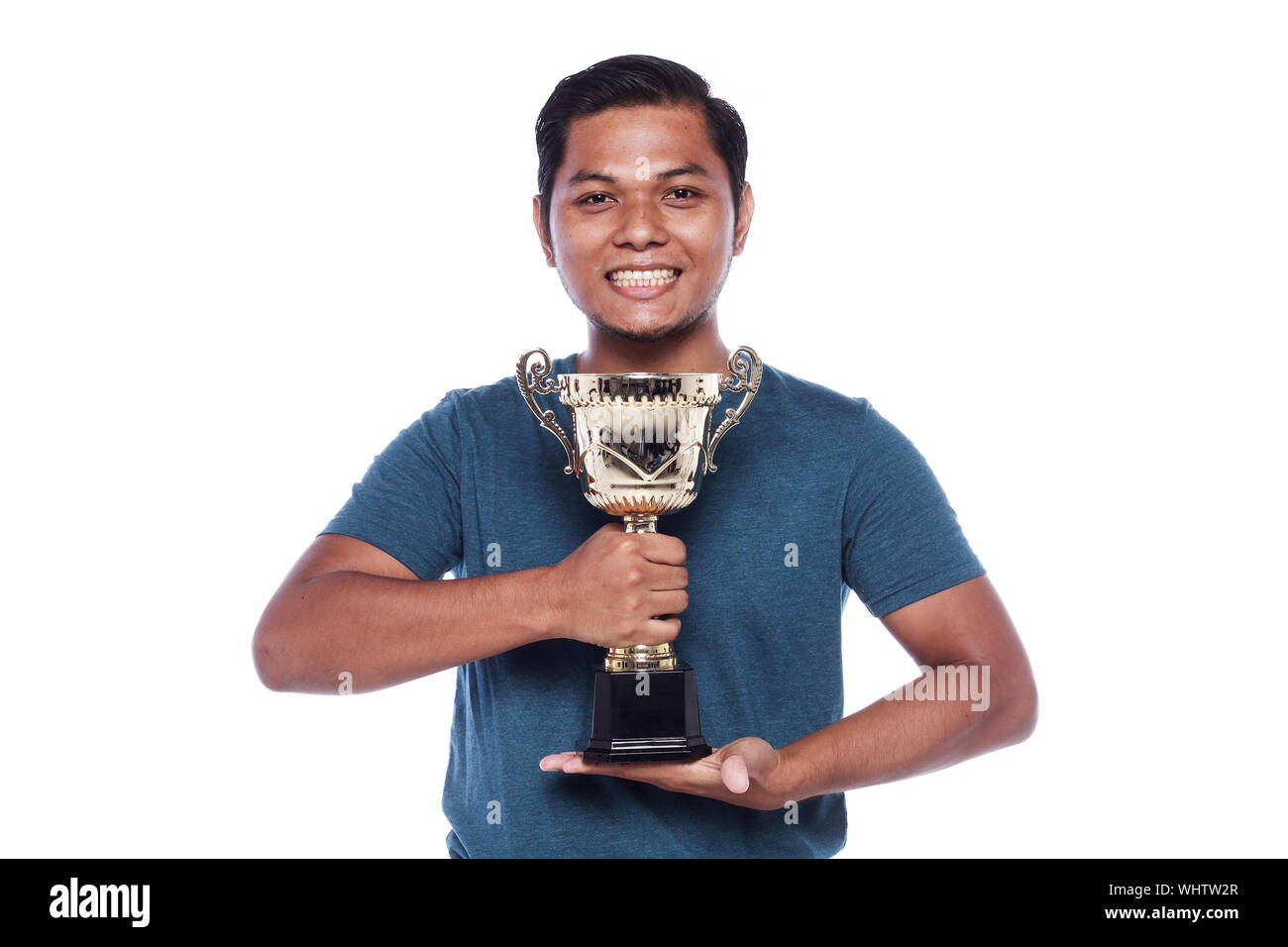Man holding trophy hi-res stock photography and images - Alamy
