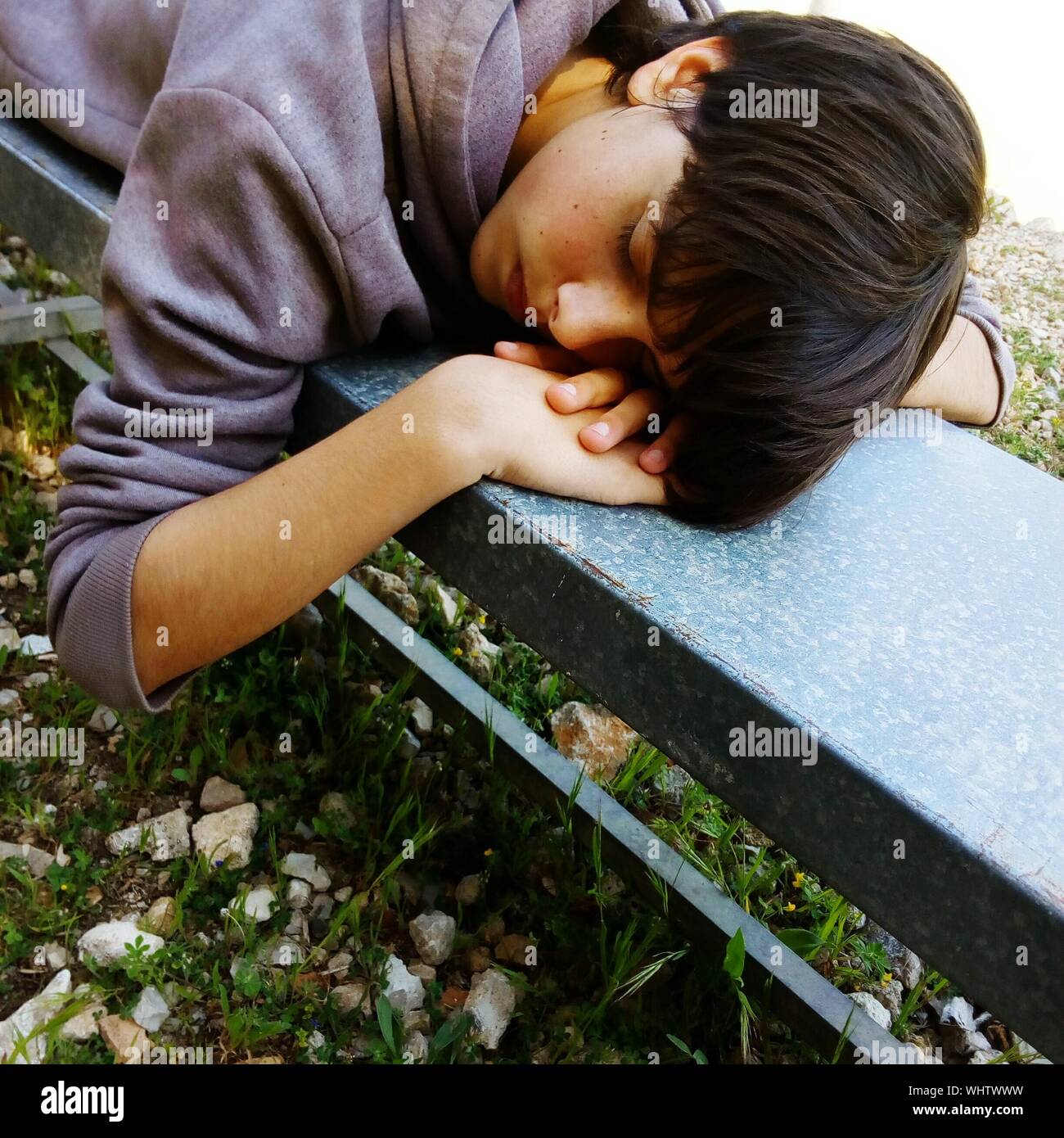 Sleeping On Park Bench High Resolution Stock Photography and Images - Alamy